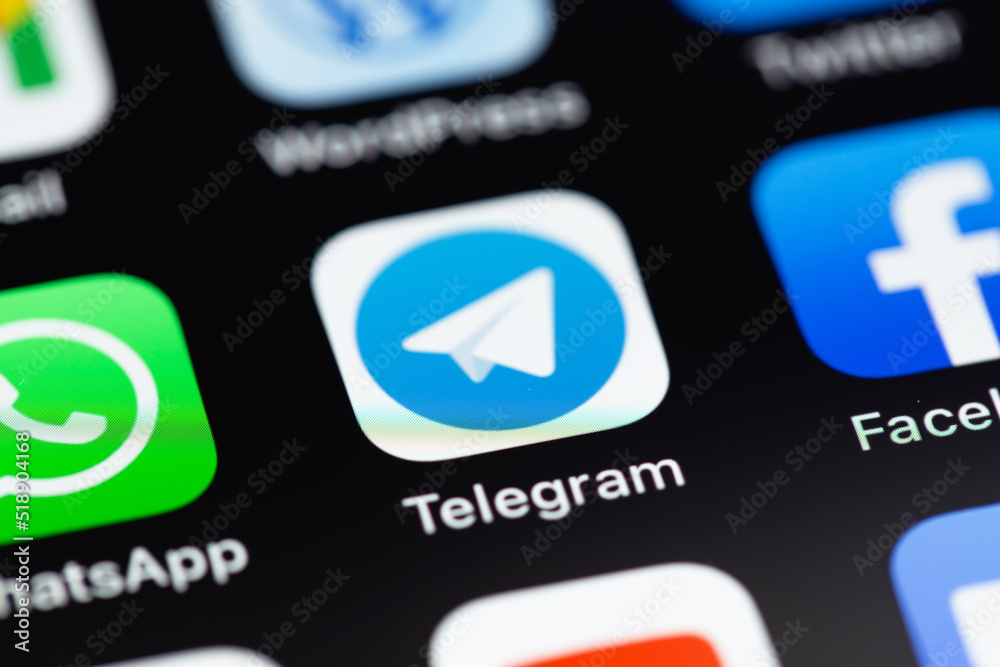 Telegram mobile icon app on screen smartphone iPhone interface closeup ...