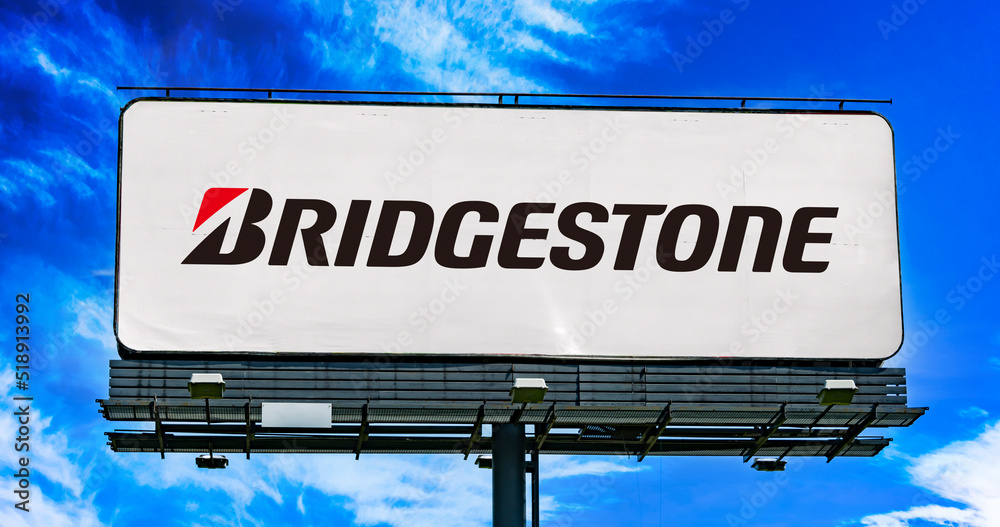 Advertisement billboard displaying logo of Bridgestone Stock Photo ...