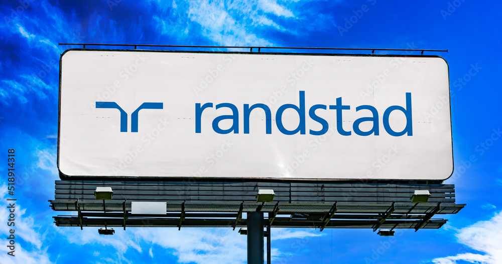 Advertisement billboard displaying logo of Randstad Stock Photo | Adobe ...