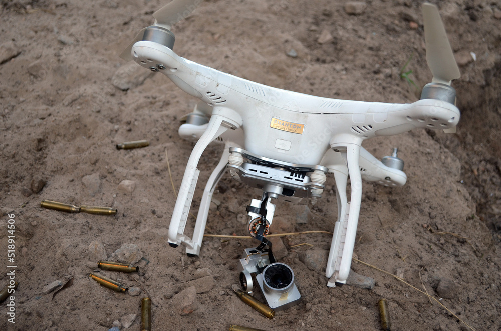Weapons of the Third World War. Concept.Crashed drone Phantom 3 Pro and ...