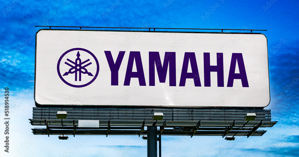 Advertisement billboard displaying logo of Yamaha Stock Photo | Adobe Stock