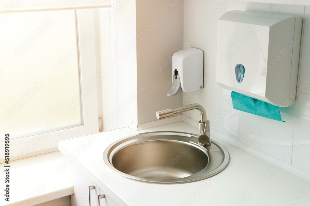 Private modern hospital ward, hand washing sink, automatic dispenser ...