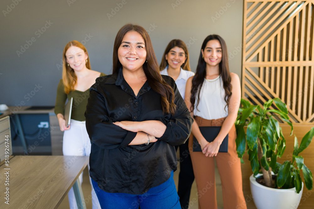 Happy female boss with a successful work team Stock Photo | Adobe Stock