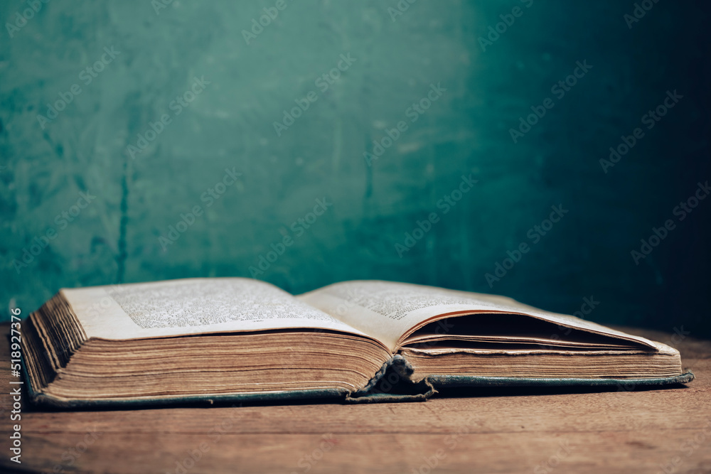 Open vintage ancient book. Pattern background for design. The book on a ...