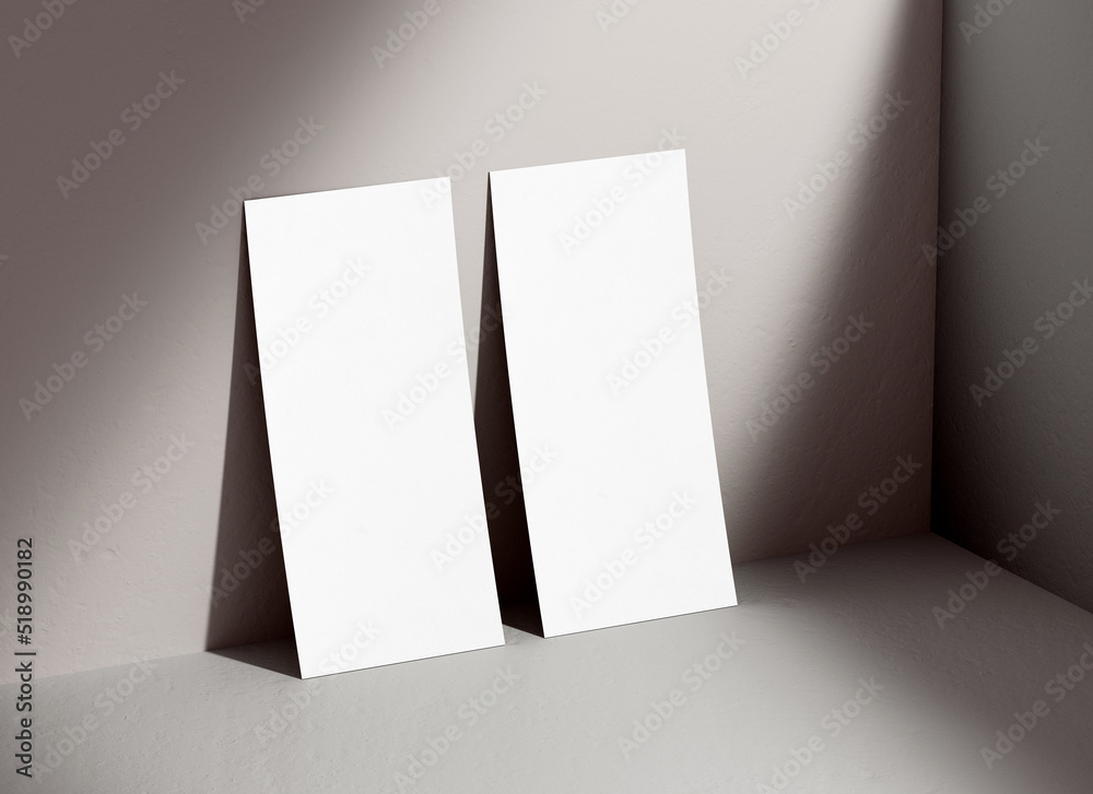 Two DL vertical flyer mockup blank paper leaning on a wall for design ...