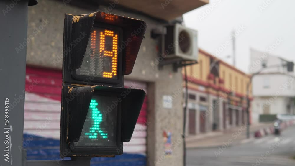 Close up view of a pedestrian traffic lights sign. Green light with ...