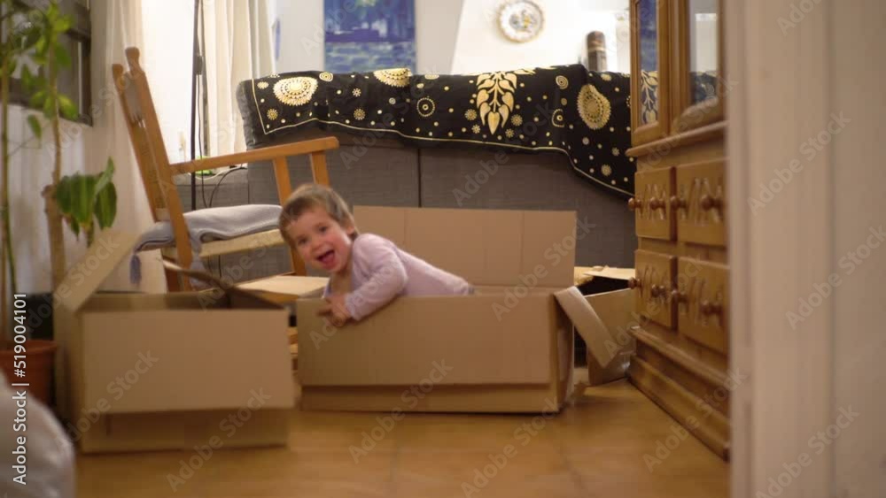 Little kids playing with moving boxes - sibling kids having fun ...