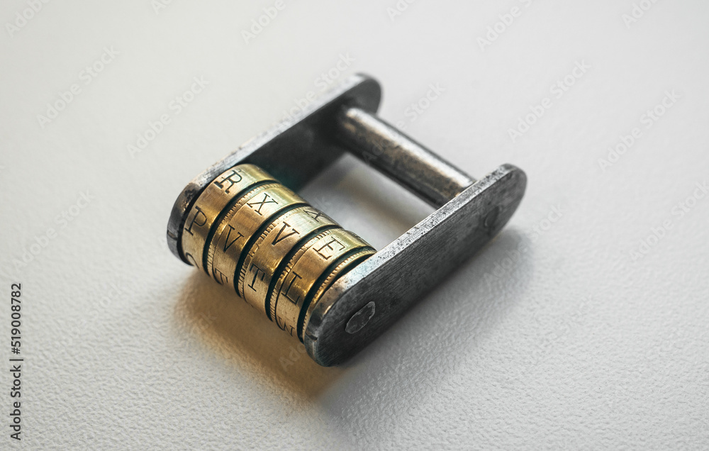 Vintage combination lock with Latin letters on a white background.Code ...
