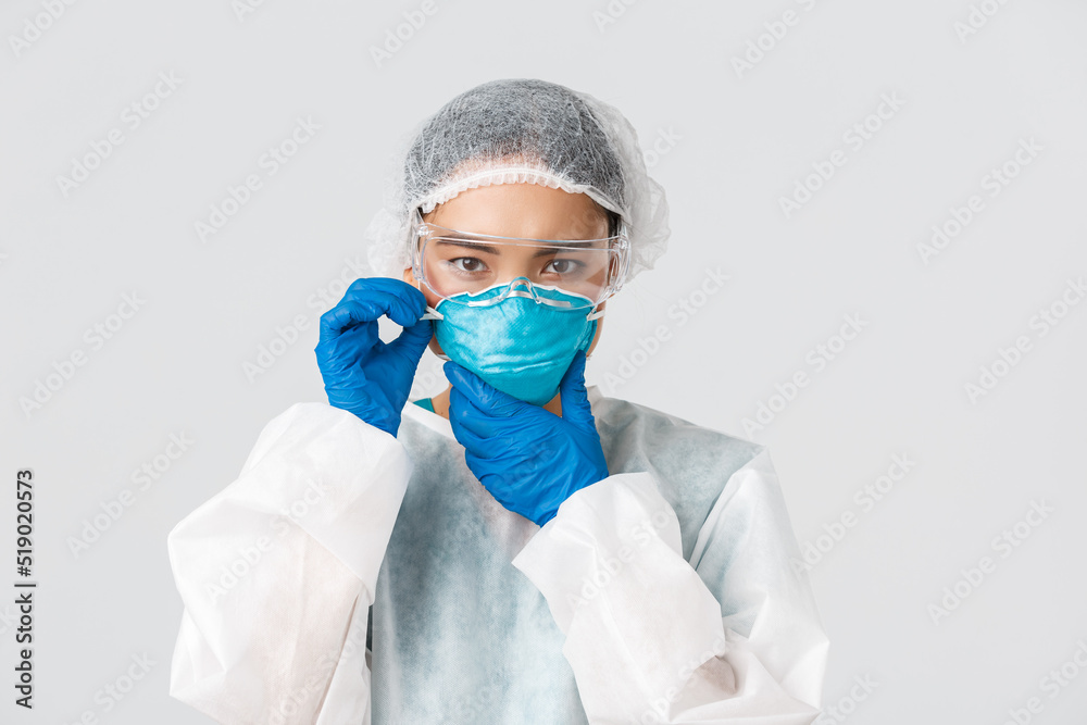 Covid-19, coronavirus disease, healthcare workers concept. Serious ... Covid-19, coronavirus disease, healthcare workers concept. Serious ...