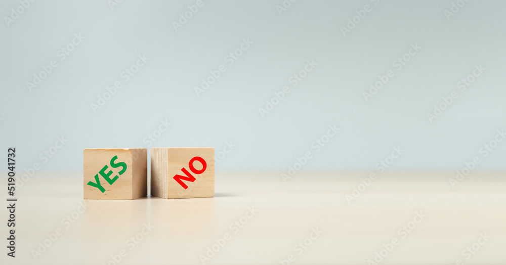 Concept of question and answer. wooden cube block with text yes or no ...
