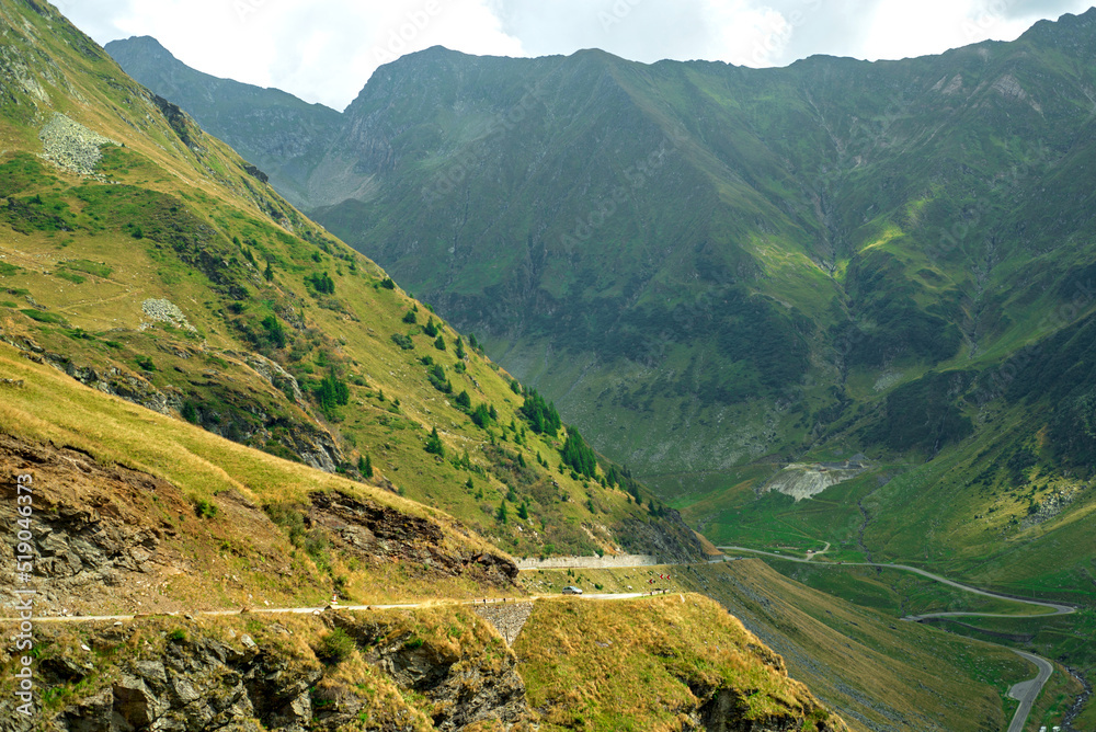 Beautiful landscape of high green mountains and turns of Transfagarasan ...