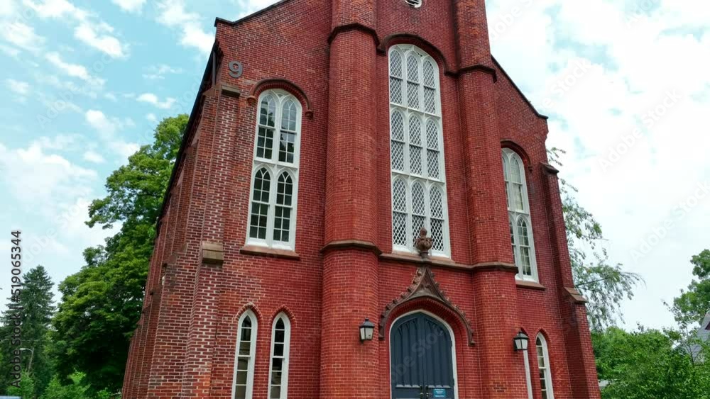 Historical brick building in quiet suburban neighborhood. Magnificent ...
