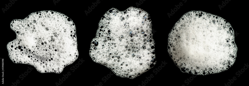 Texture of white foam on a black background. Cleansing mousse for the ...