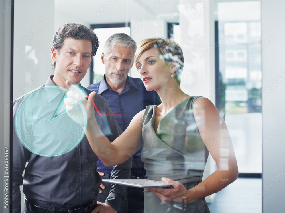 Business colleagues discussing pie chart in office Stock Photo | Adobe ...