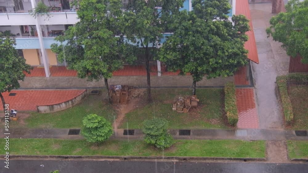 Top angle view of heavy falling rain outside, torrential downpour at ...