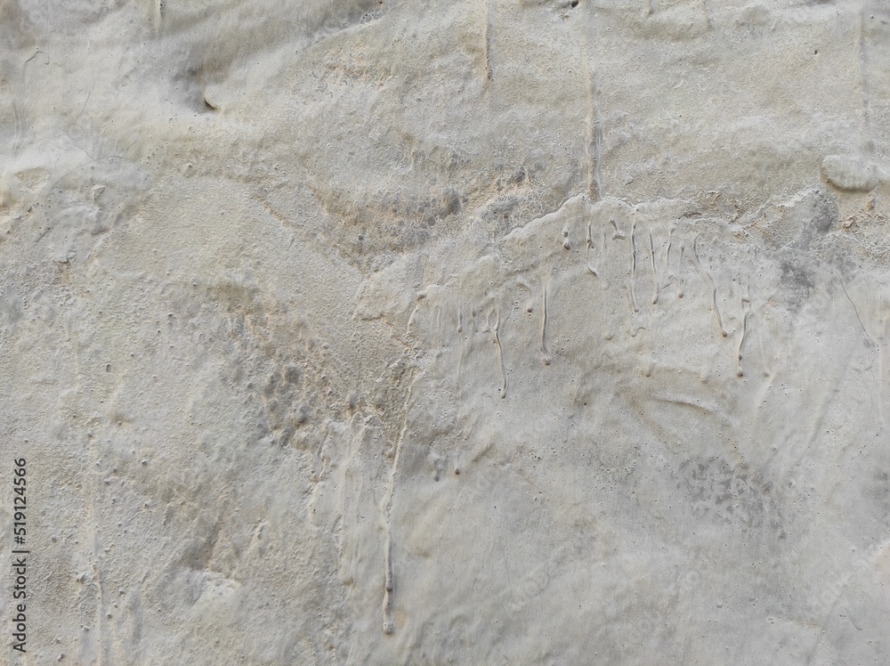 Abstract paint is peeling off the building wall.Close-up. Badly fixed ...