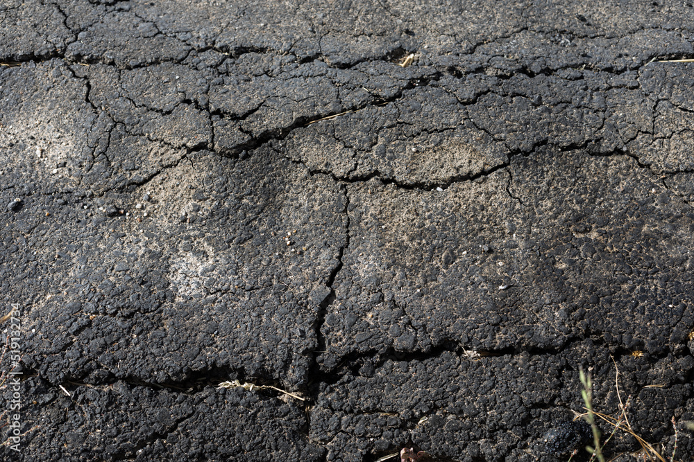 Crack in damaged road asphalt. Broken asphalt texture. Unmaintained ...