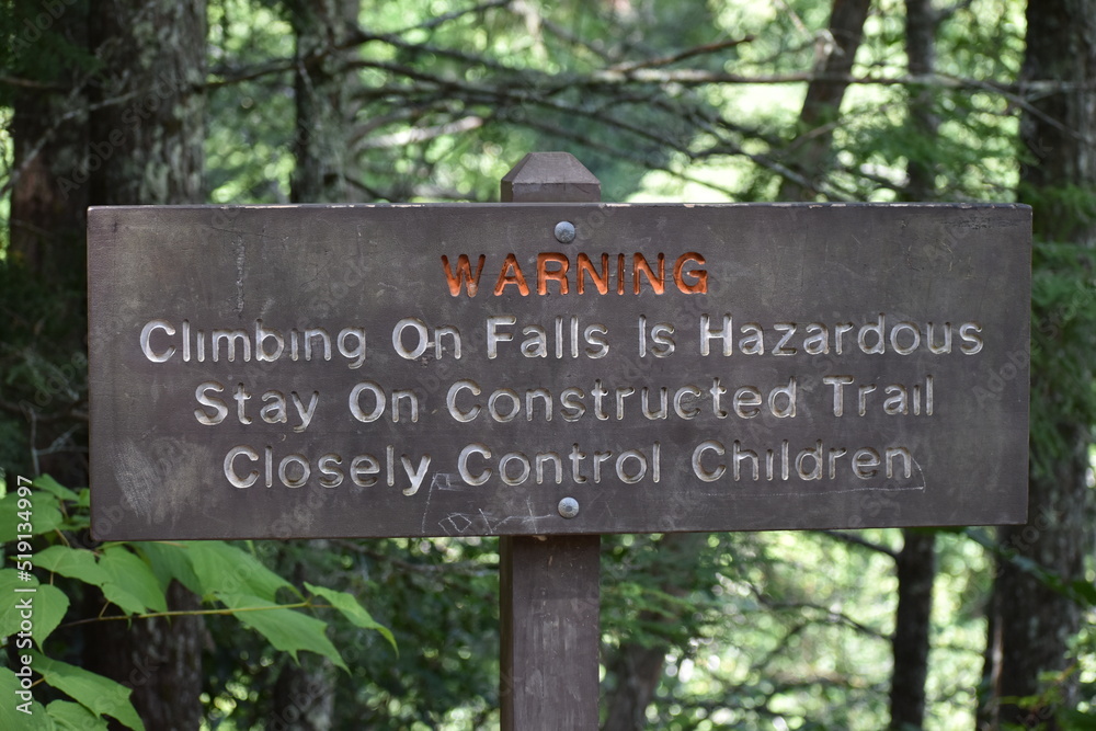 Warning sign for waterfall hazards Stock Photo | Adobe Stock