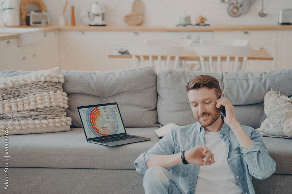 Young company male worker calling his supervisor while sending ...
