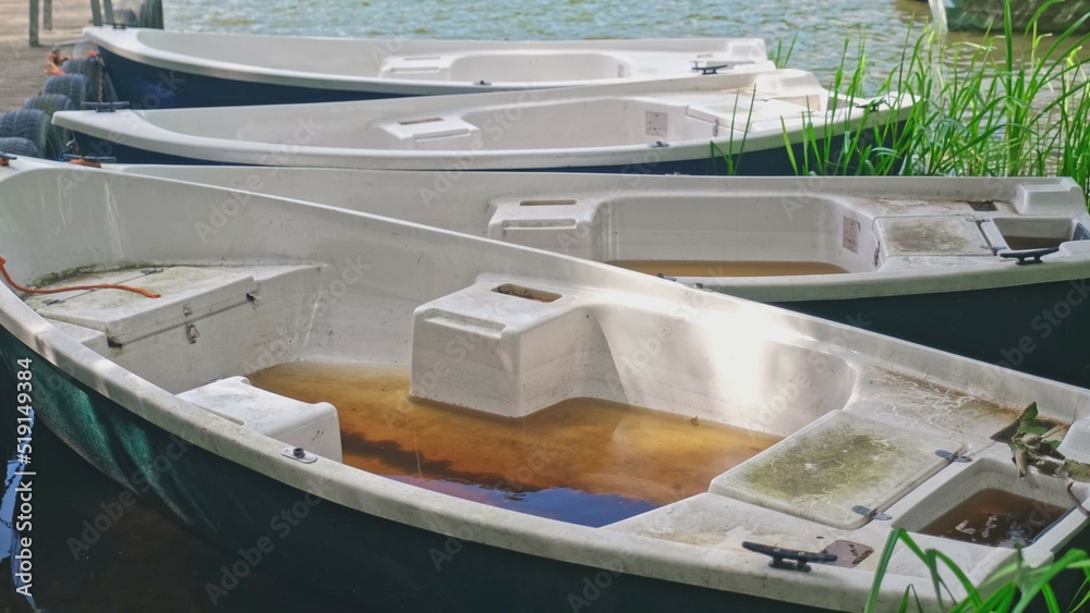 Sinking Leaky Rowing Boat Parked by Wooden Quay Bridge at Small Lake ...