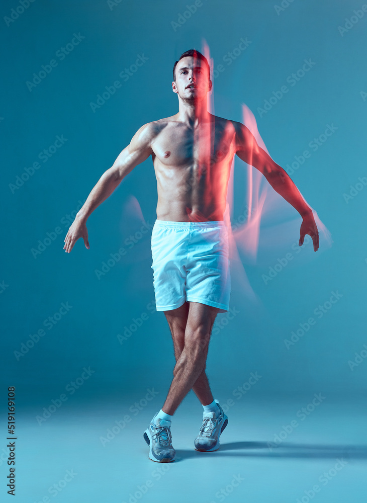 Dancing young muscular shirtless male performing modern zumba dance in ...