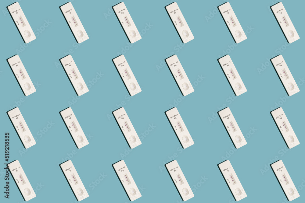Positive Covid-19 antigen test pattern on light blue background with ...