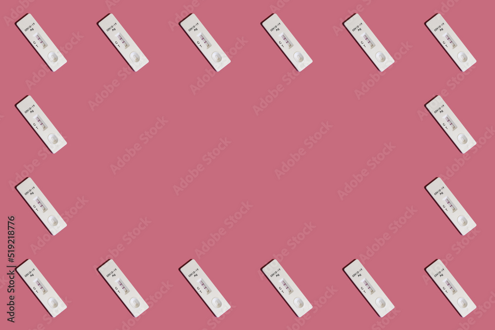 Positive Covid-19 antigen test pattern frame on pink background with ...