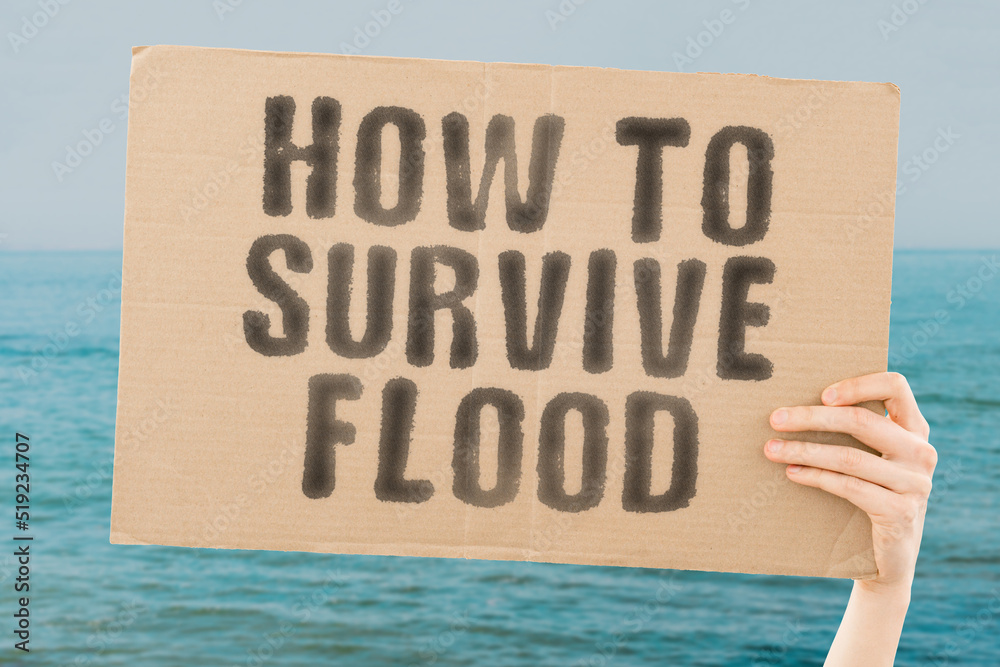 The phrase " How to survive war " is on a banner in men's hands with ...