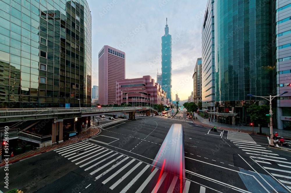 Cityscape of a street corner in Downtown Taipei City with traffic ...