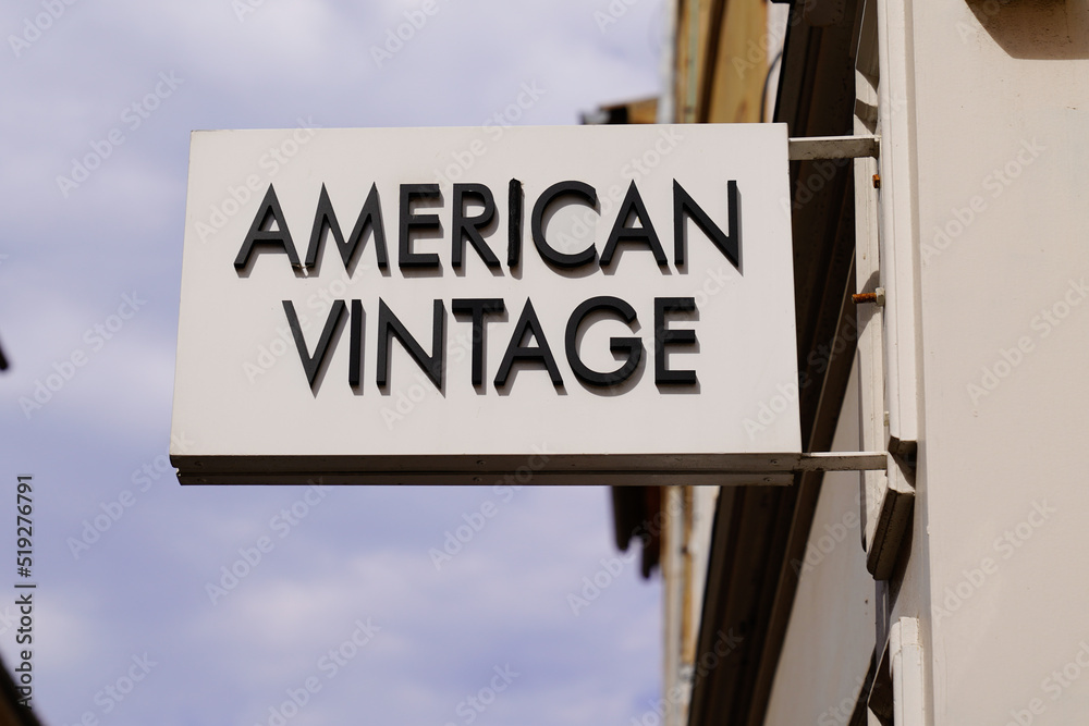 American Vintage brand logo and sign text facade french store ...