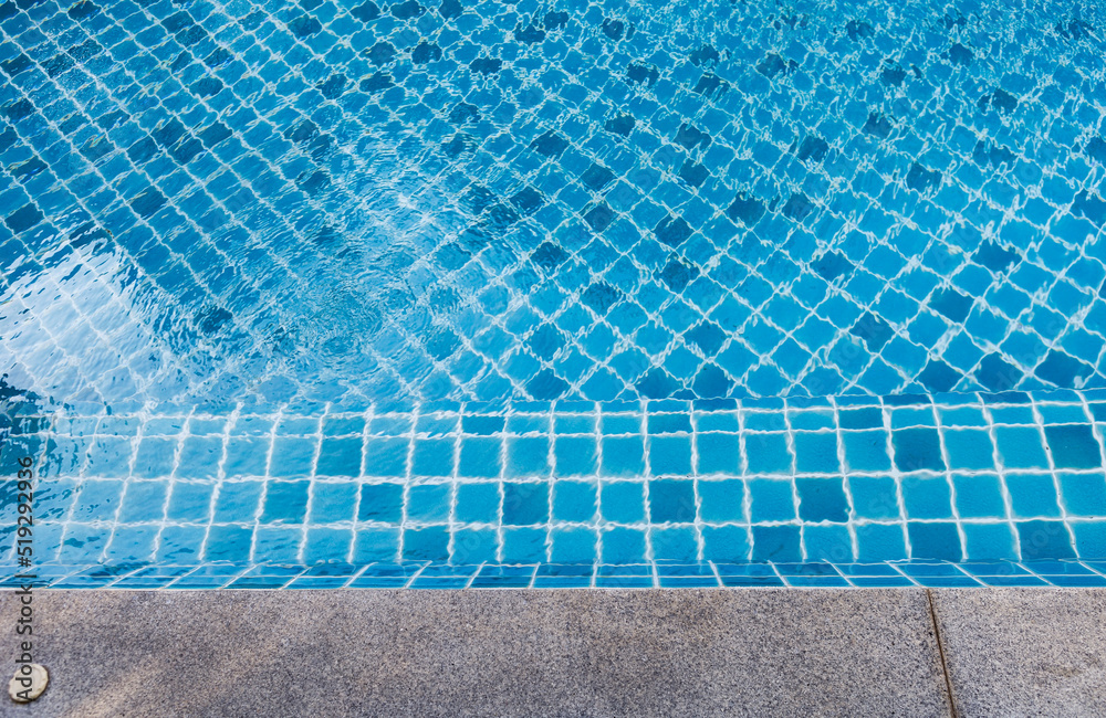 Swimming pool background, crystal clear water with blue swimming pool ...