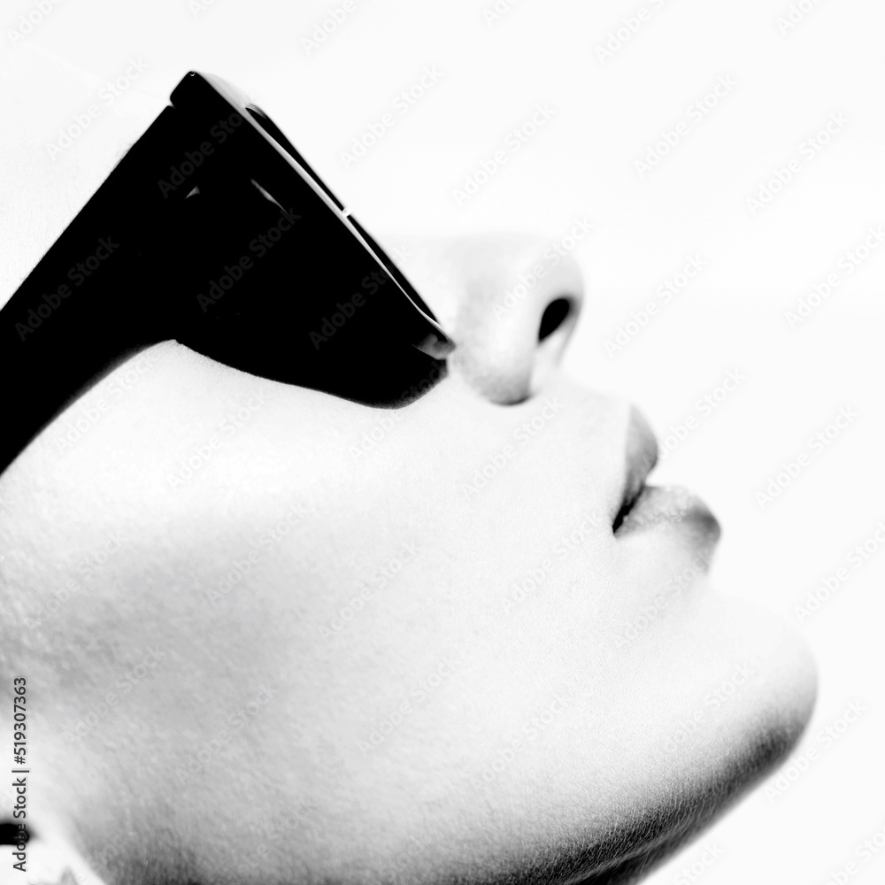 Fashion concept. Close-up woman profile portrait with sunglasses ...