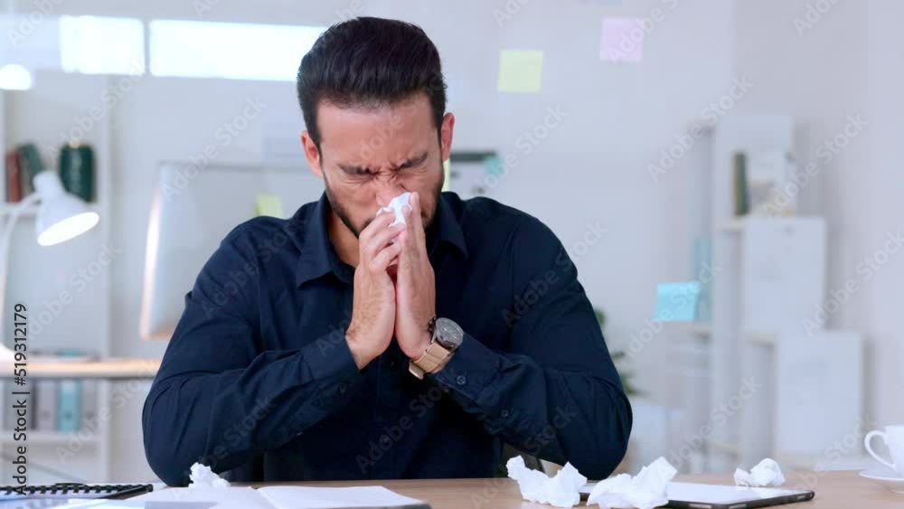 Video „Sick business man sneezing and blowing his runny nose with a ...