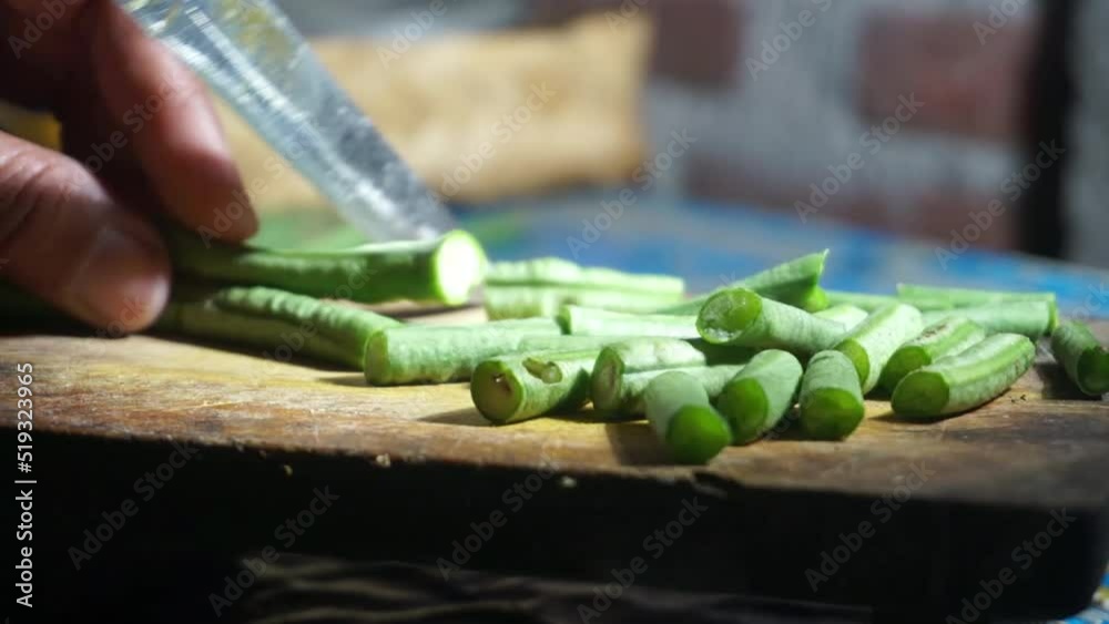 Cutting long beans with a knife, simple cooking with traditional ...