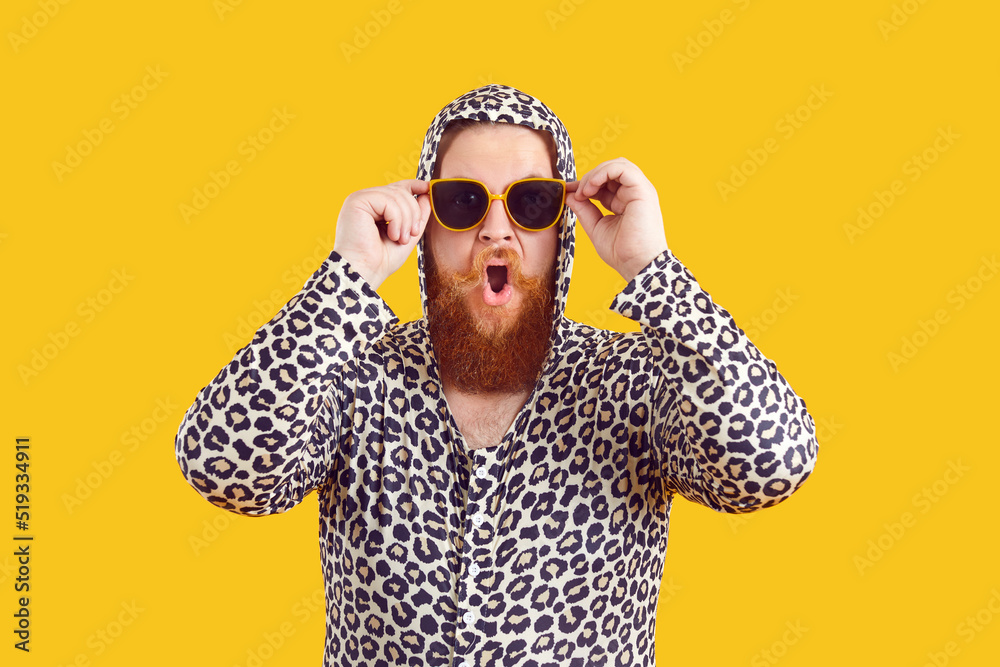 Eccentric bearded fat man with funny crazy shocked facial expression on ...