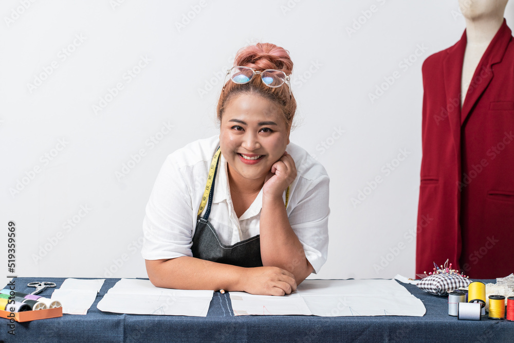 Asian tailors and designers are designing a pattern for a skirt with ...