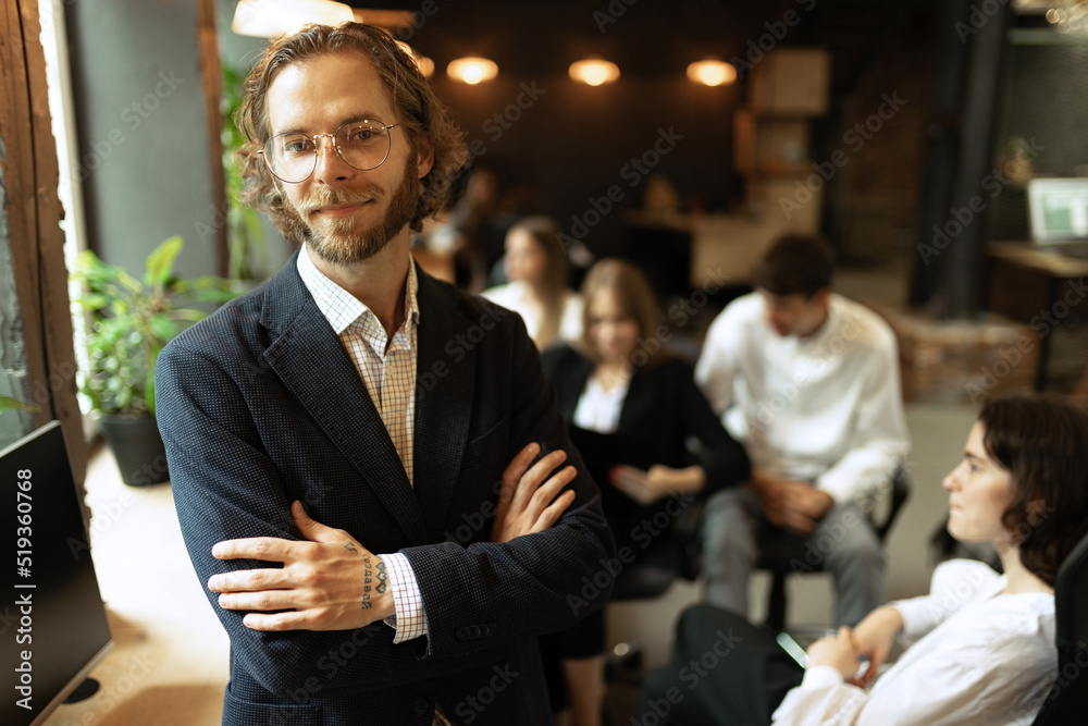 Young man in official suit, office worker, manager working on new ...