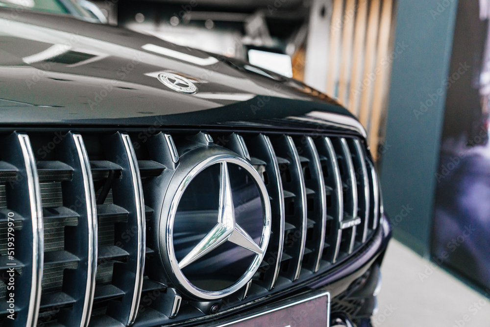 logo and grille radiator. part of a white Mercedes CLS car. Stock Photo ...