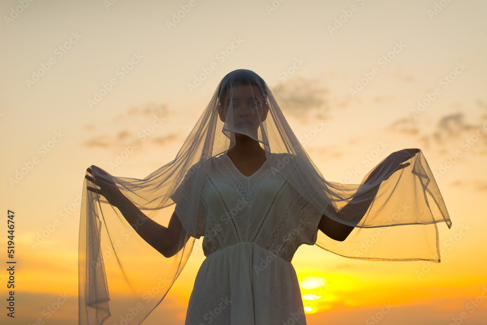 Beautiful young woman dancing with veil during summer sunset Stock ...