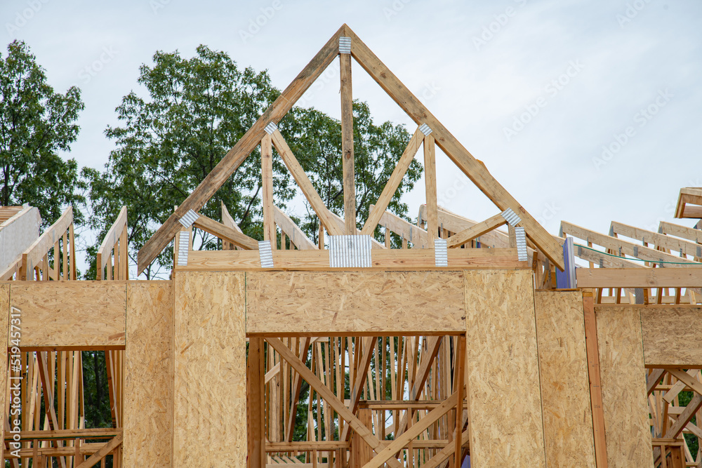 Foto de installation of rafters of a plywood house building wall studs wooden do Stock | Adobe Stock