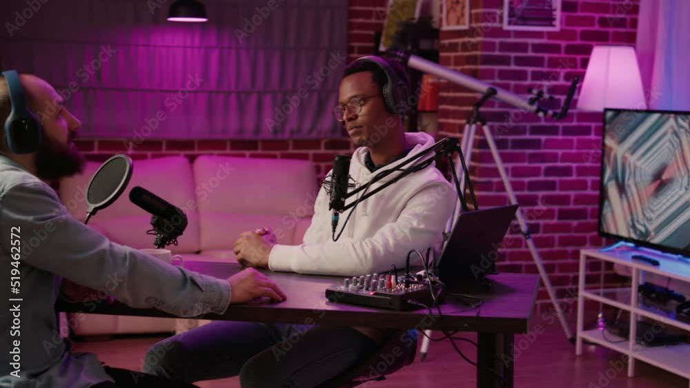 African american host talking in online podcast episode recording live ...