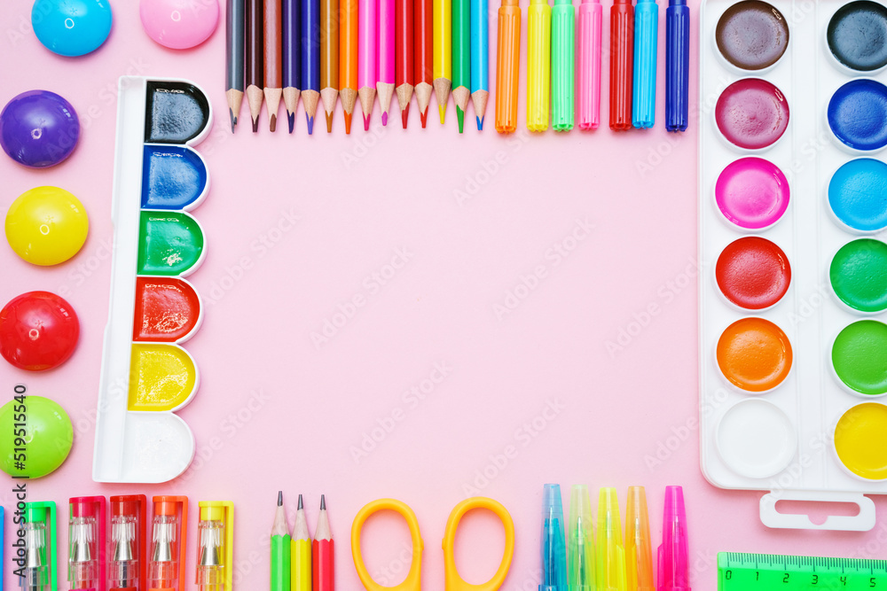 School supplies, colored pencils, watercolor paints, pens, ruler and ...
