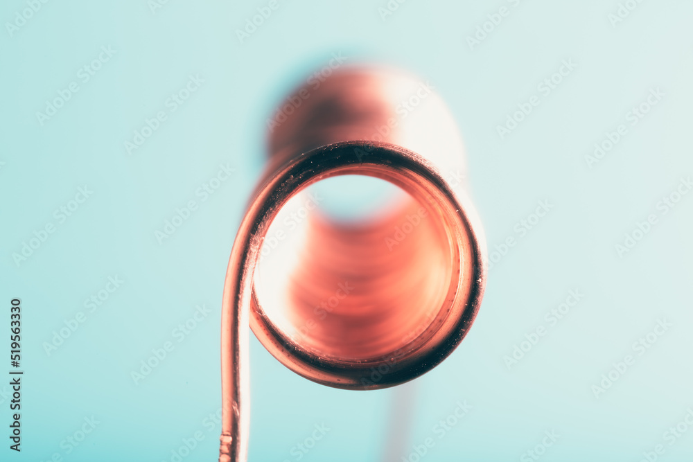 Beautiful macro close-up side view of twisted copper spring wire on a ...