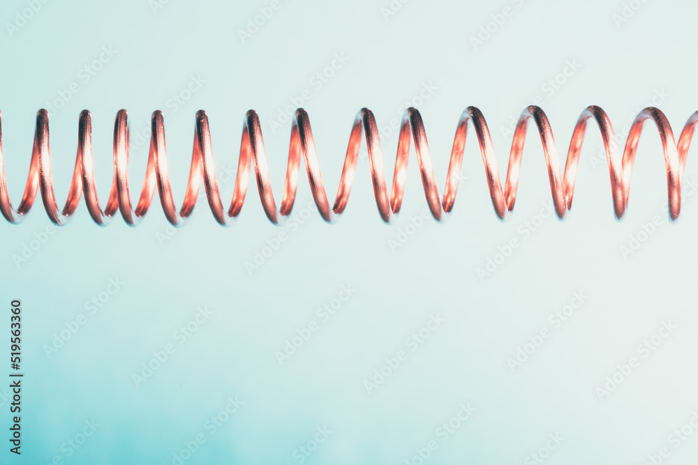 Beautiful macro close-up of twisted horizontal copper spring wire on a ...