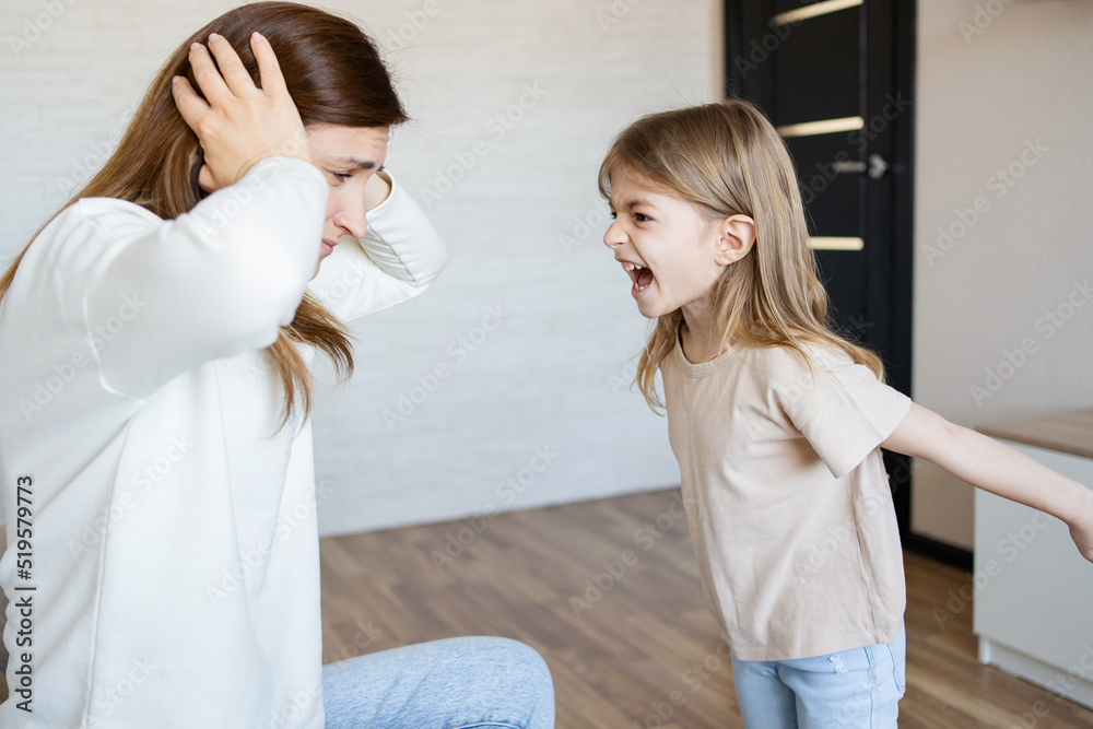 Scolding, yelling child, conflict in family. Stock Photo | Adobe Stock