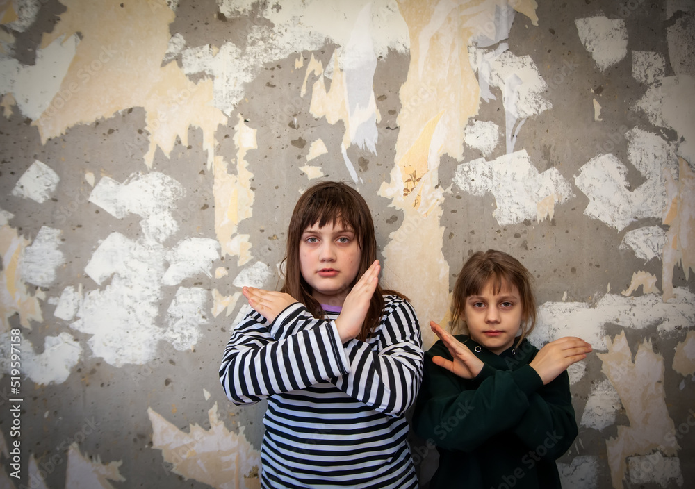Two children holding hands cross to cross , children against war Stock ...