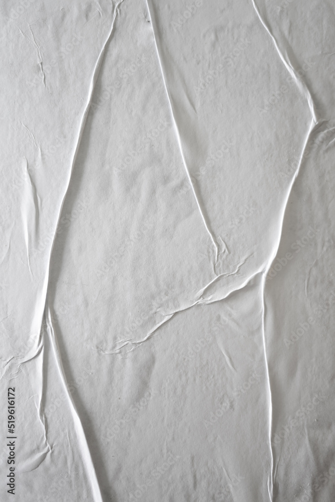 Blank white glued paper for poster texture overlay. Crumpled and ...