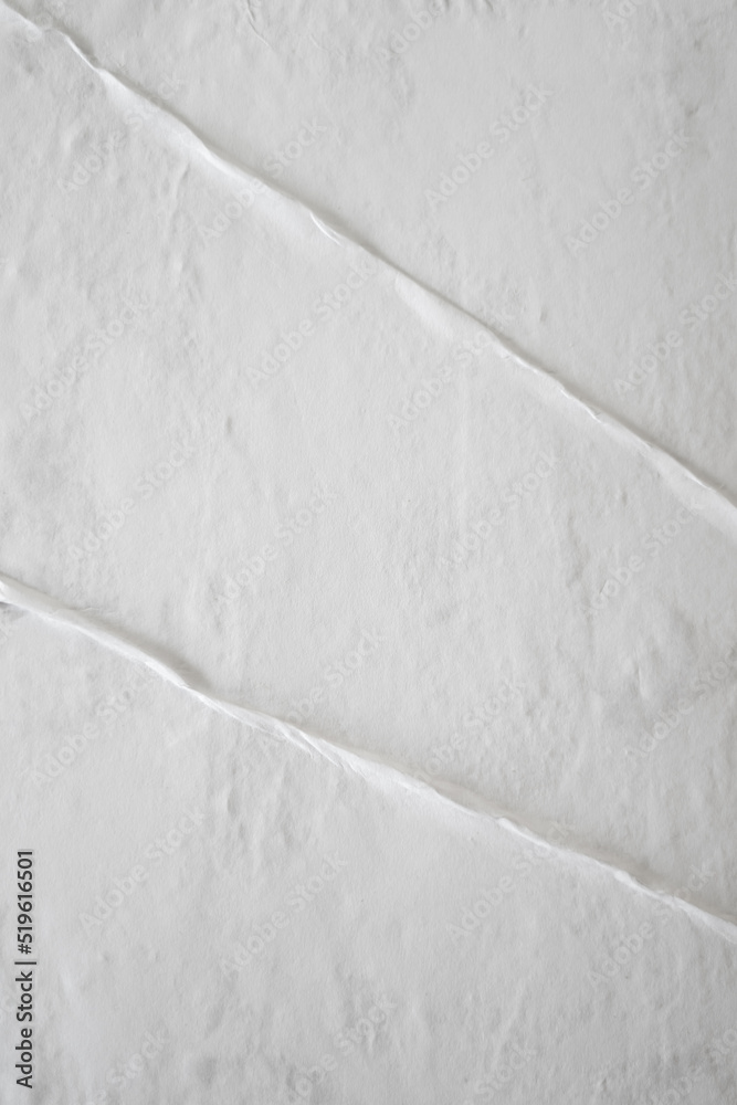 Blank white glued paper for poster texture overlay. Crumpled and ...