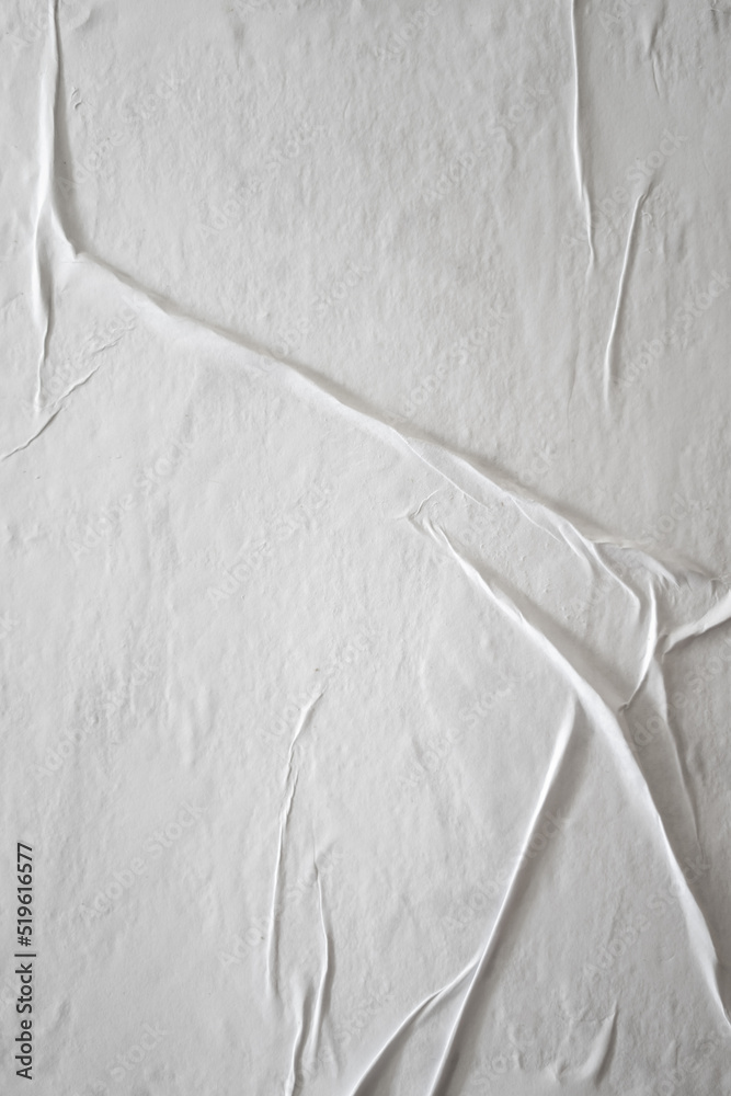 Foto Stock Blank white glued paper for poster texture overlay. Crumpled ...