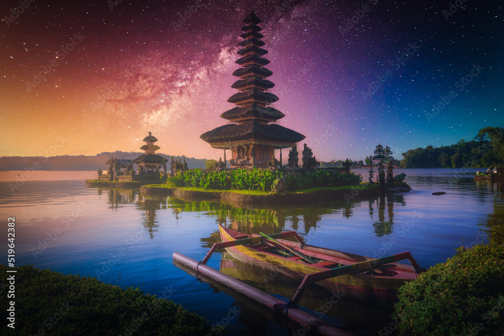 Pura Ulun Danu Bratan, Hindu temple with boat on Bratan lake landscape with milky way in Bali ...